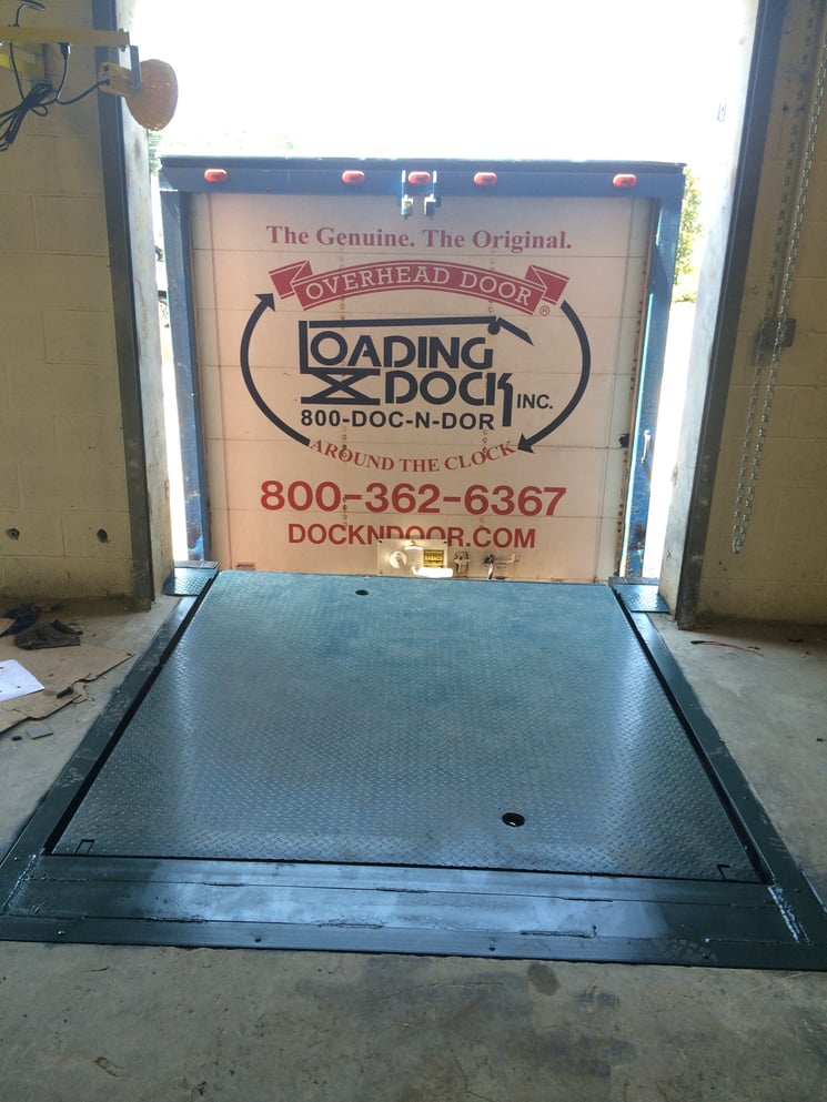 Extended Loading Dock Levelers & Tapered Dock Seals for Declining Driveways Extended Loading Dock Levelers & Tapered Dock Seals for Declining Driveways